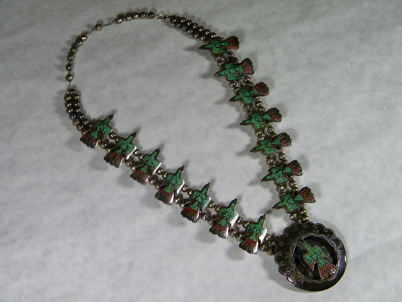 Thomas Singer Hallmark - Real vs. Fake - Turquoise People