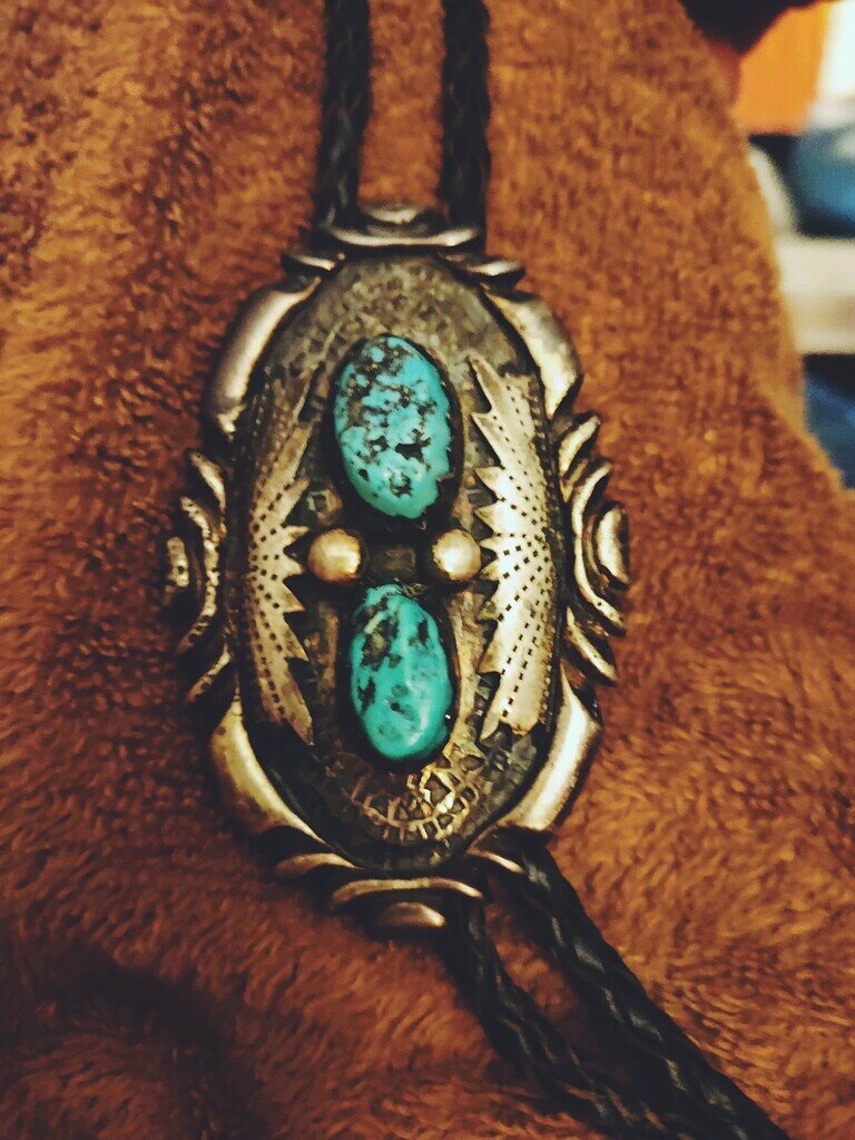 Who made this awesome bolo! I love wearing! G with wings under it ...