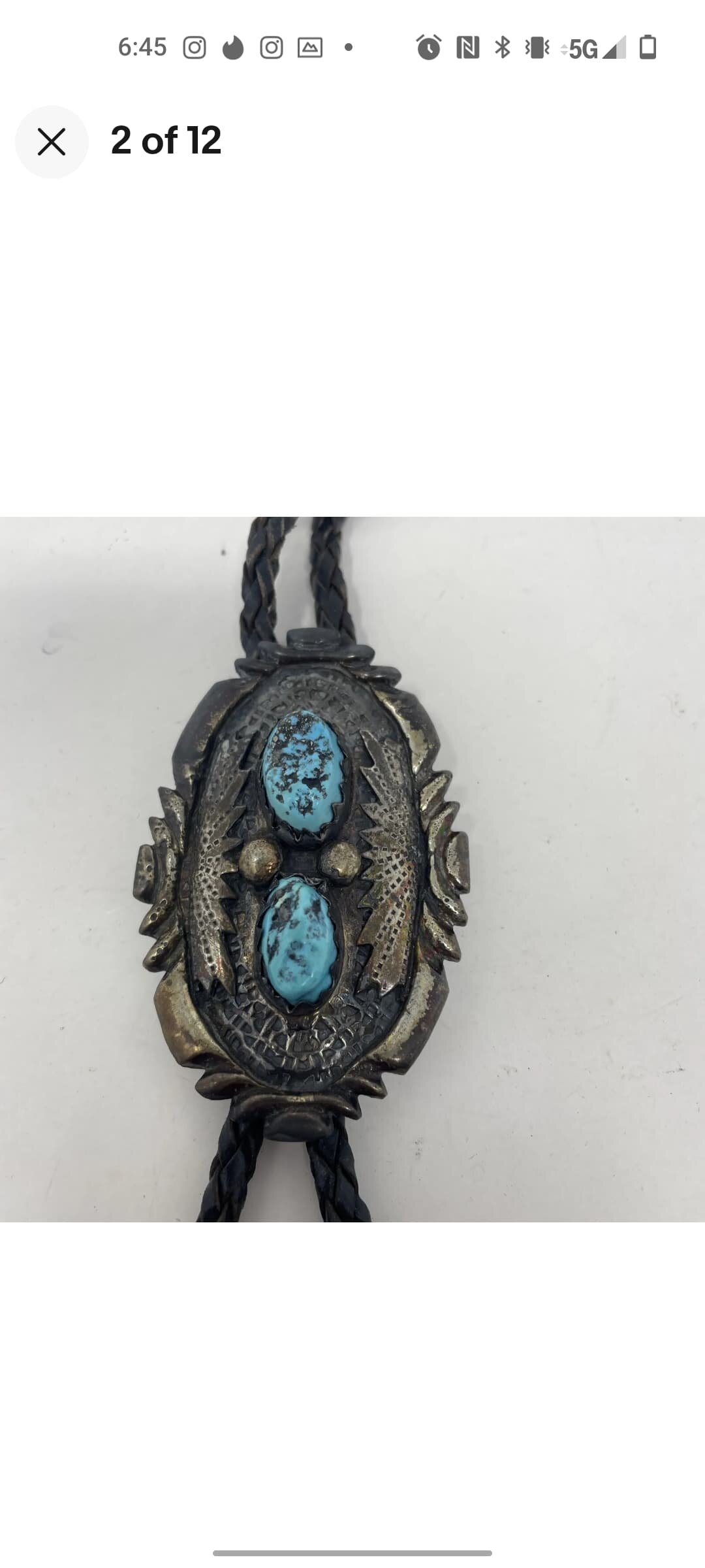 Who made this awesome bolo! I love wearing! G with wings under it ...